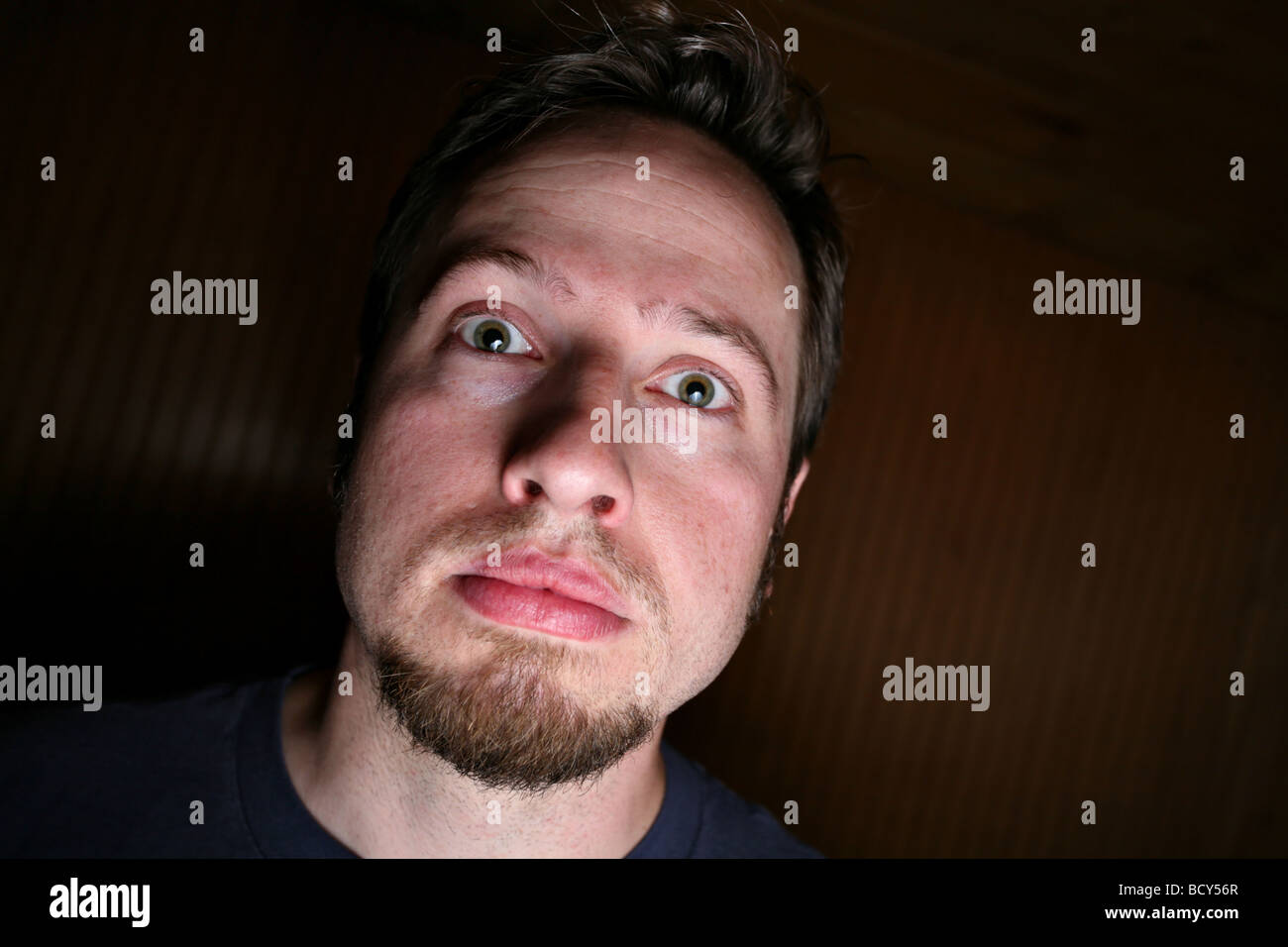 Man with stony face Stock Photo - Alamy