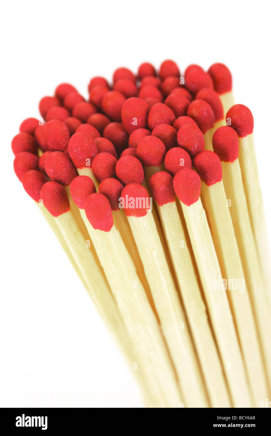 Red head matches isolated against a white background Stock Photo - Alamy