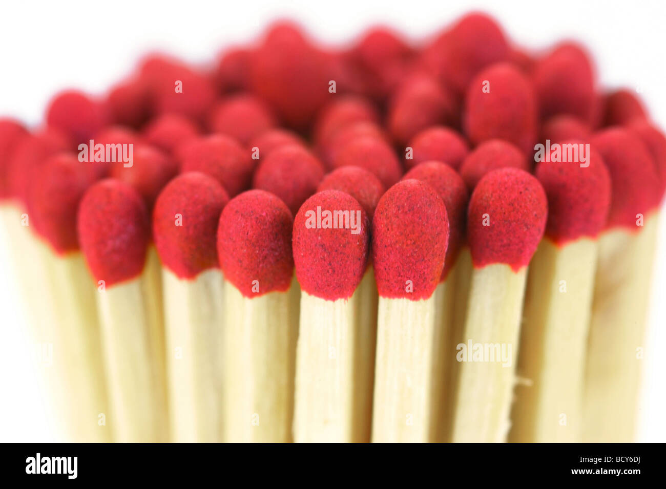 Red head matches isolated against a white background Stock Photo - Alamy