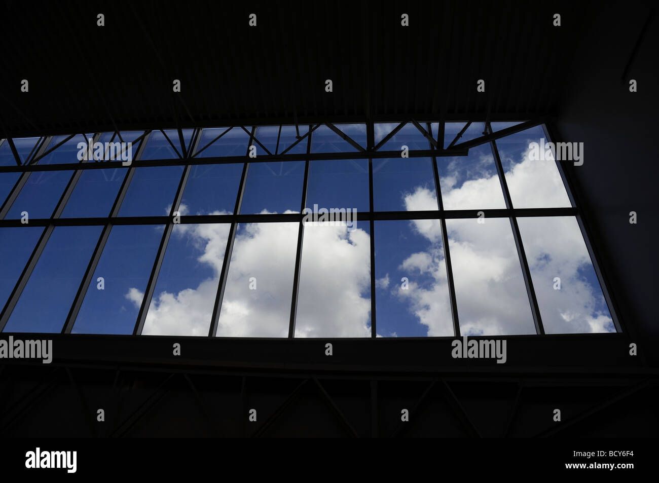 large window showing white clouds and blue sky Stock Photo - Alamy