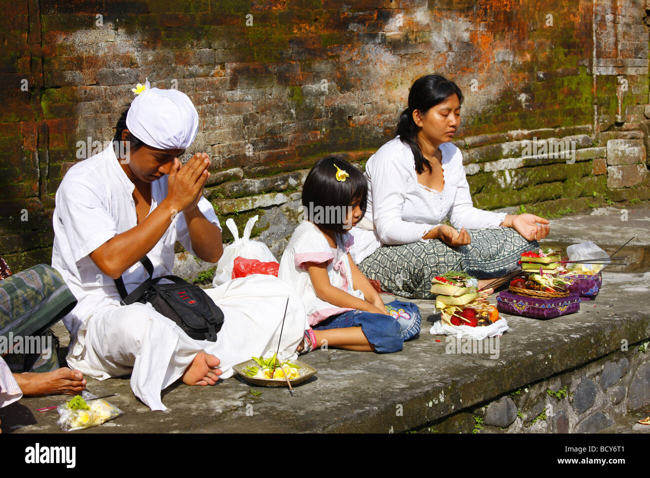 People at a ceremony at a sacred spring, Tirta Empul at Tampak Siring ...