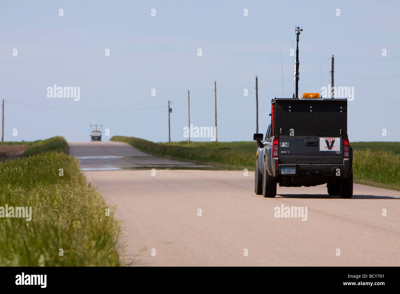 Tornado truck driving into storm hi-res stock photography and images ...