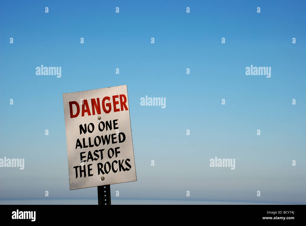 Danger sign on the shores of Lake Michigan Stock Photo - Alamy