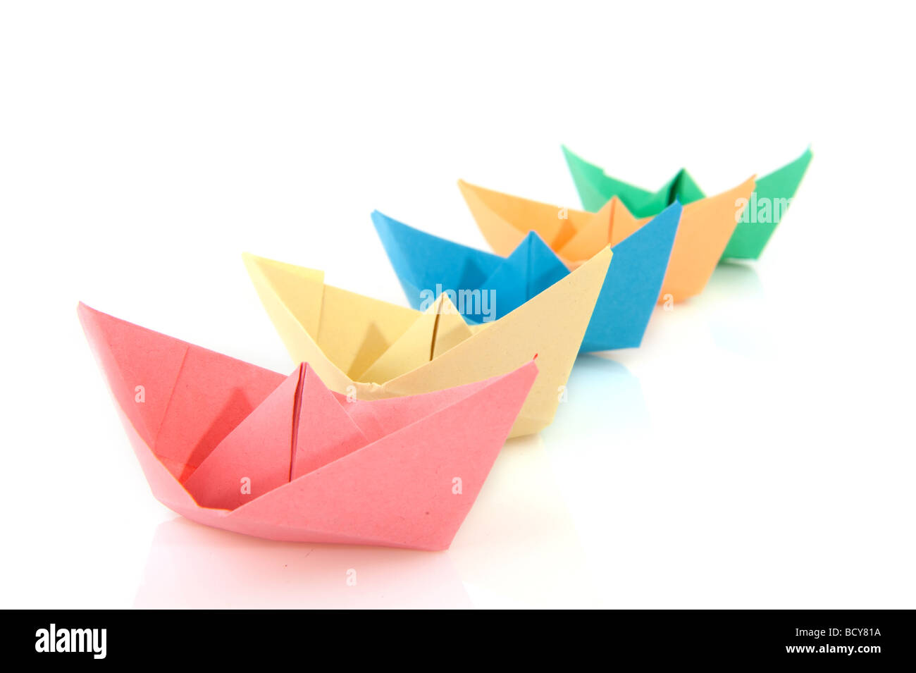 colorful folder paper boats isolated over white Stock Photo - Alamy