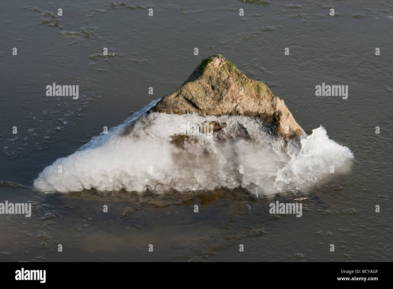 Frozen stone in winter in harbour of Helsinki Finland Stock Photo - Alamy