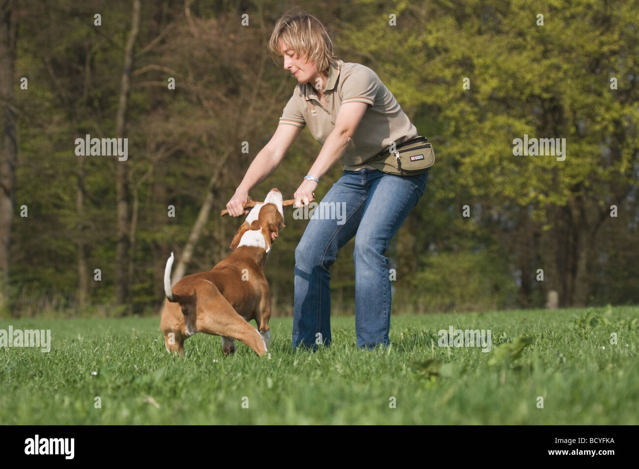 Half breed dog woman playing hi-res stock photography and images - Alamy