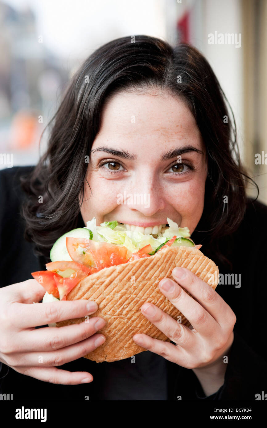 Woman Eating Sandwich Stock Photo - Alamy