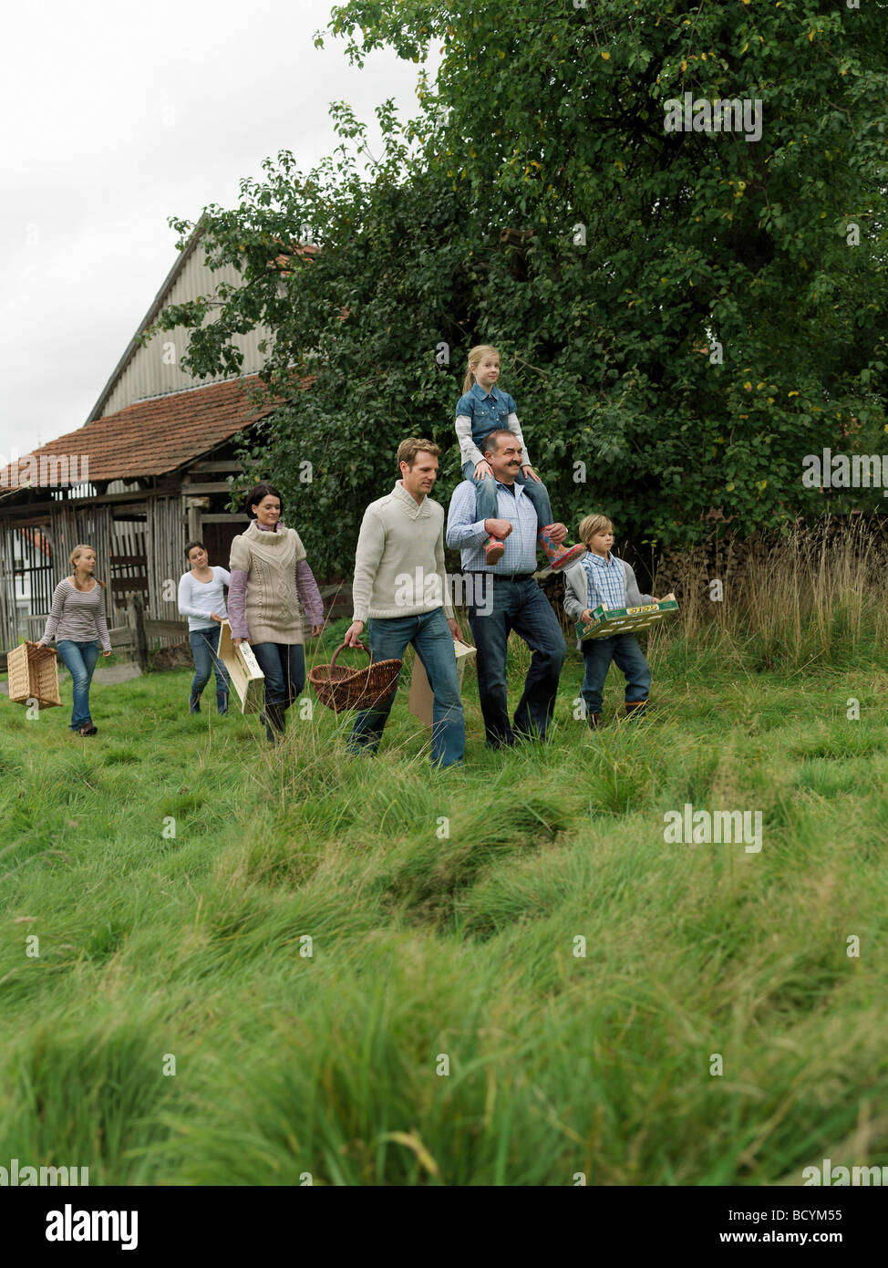 Family going apple picking together Stock Photo - Alamy