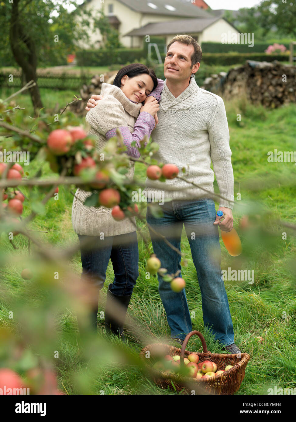 Mature woman embracing tree eyes hi-res stock photography and images ...