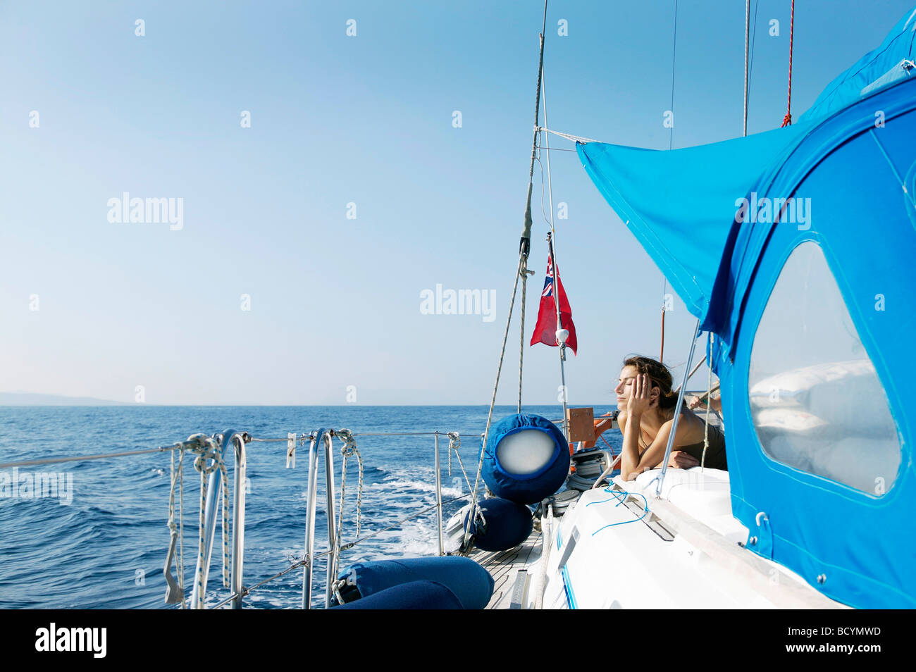 Woman Relaxing on Sailing Boat Stock Photo - Alamy