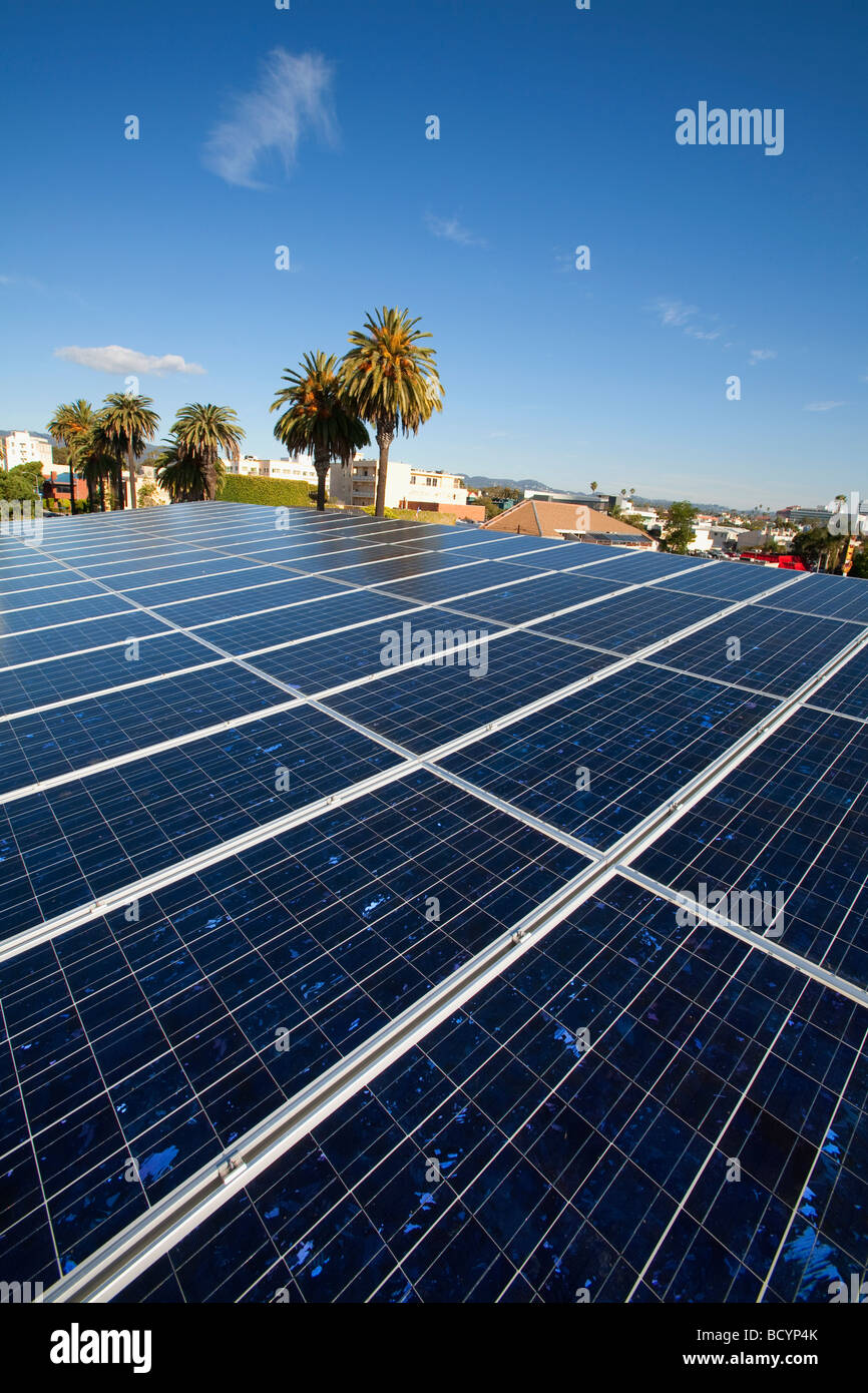 A roof mounted, grid tied Solar Voltaic solar panel array (10Kw) on top ...