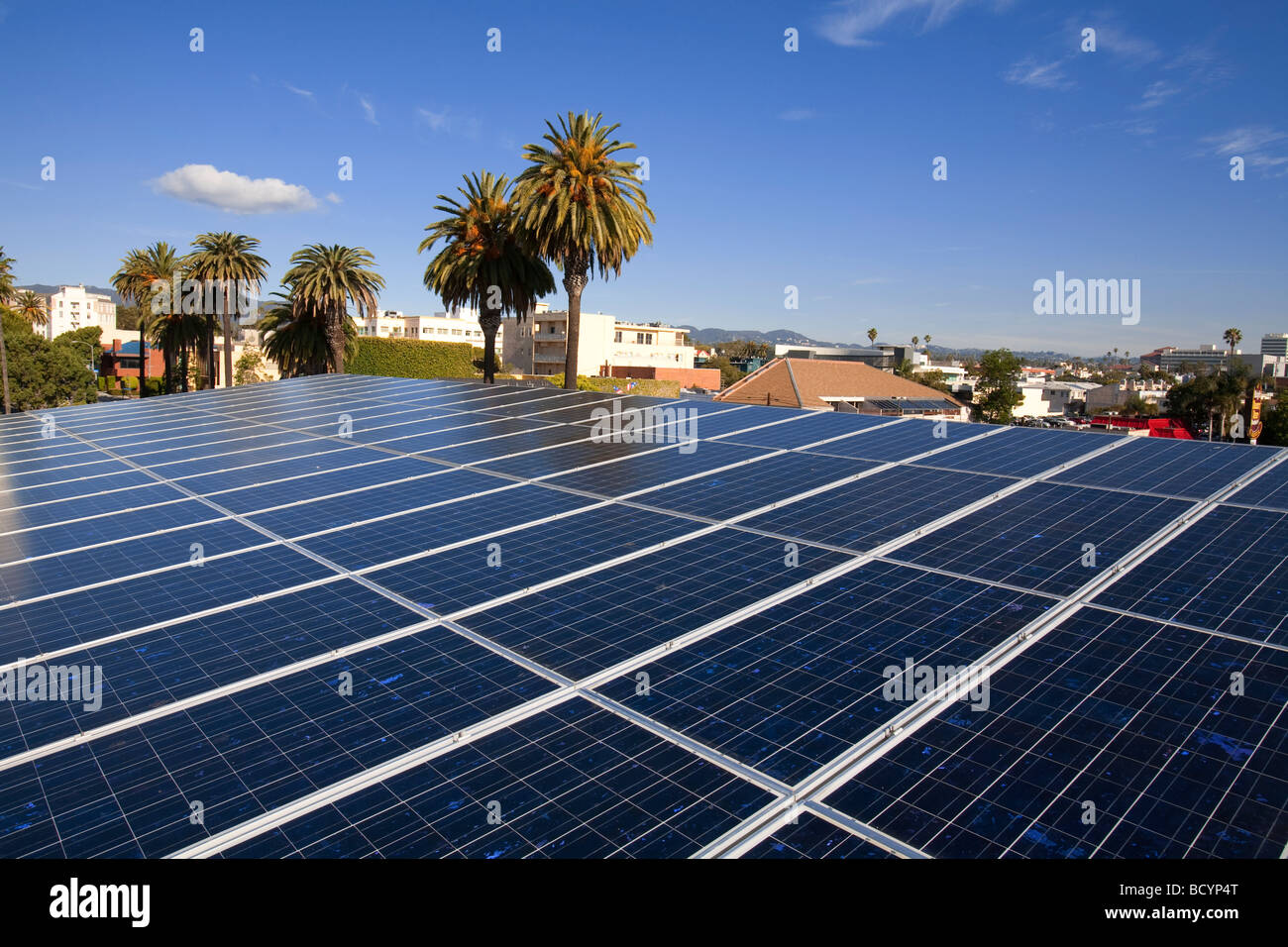 A roof mounted, grid tied Solar Voltaic solar panel array (10Kw) on top ...