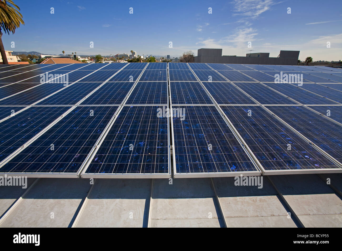 A roof mounted, grid tied Solar Voltaic solar panel array (10Kw) on top ...