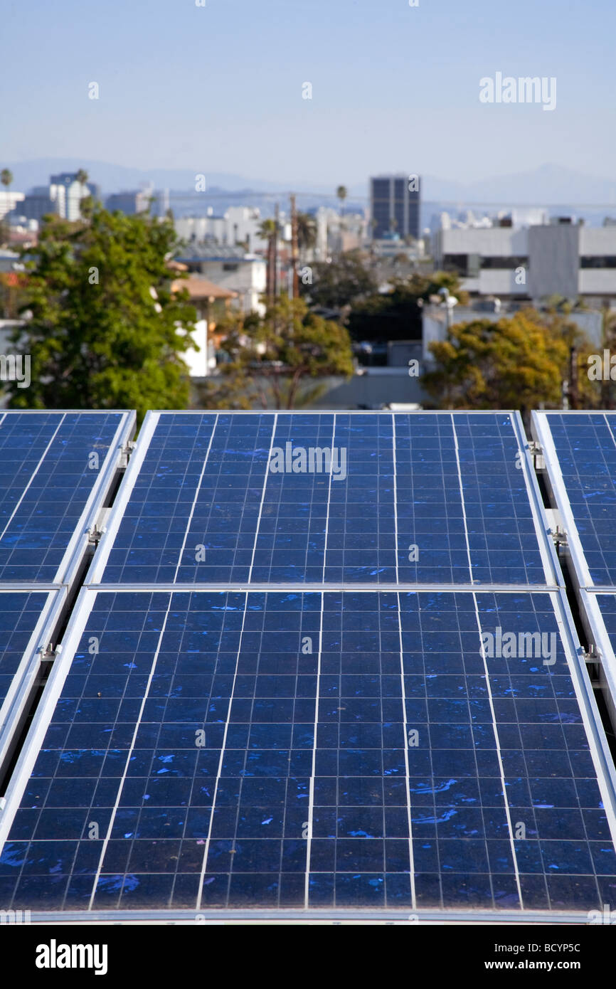 A roof mounted, grid tied Solar Voltaic solar panel array (10Kw) on top ...