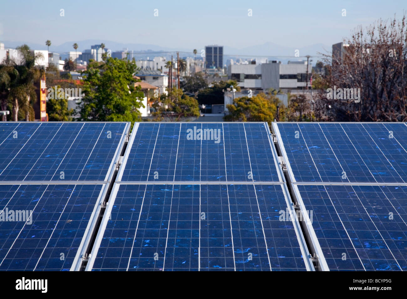 A roof mounted, grid tied Solar Voltaic solar panel array (10Kw) on top ...