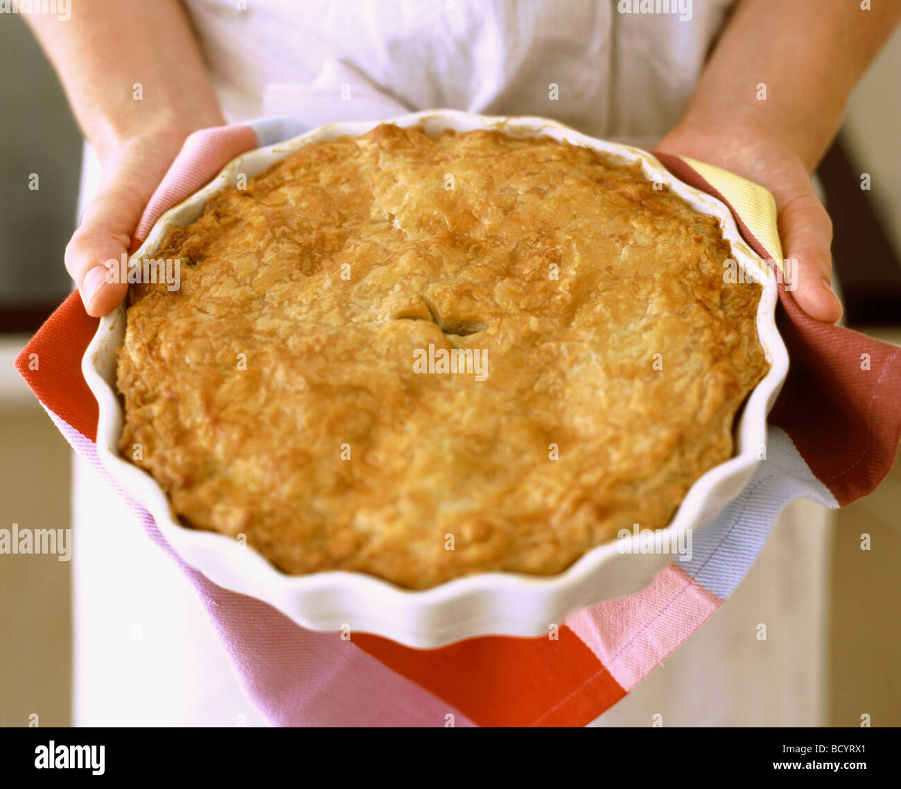 Hand holding pie hi-res stock photography and images - Alamy