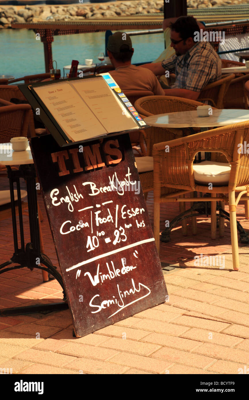 Restaurant sign advertising English breakfast in three languages Stock ...