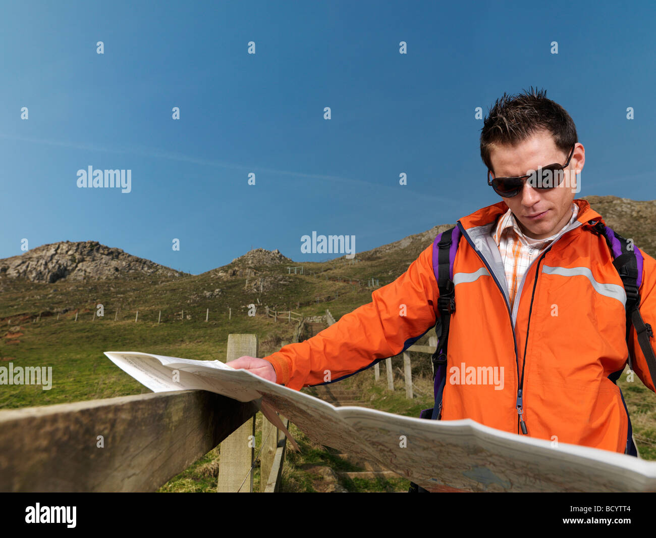 man with map Stock Photo - Alamy