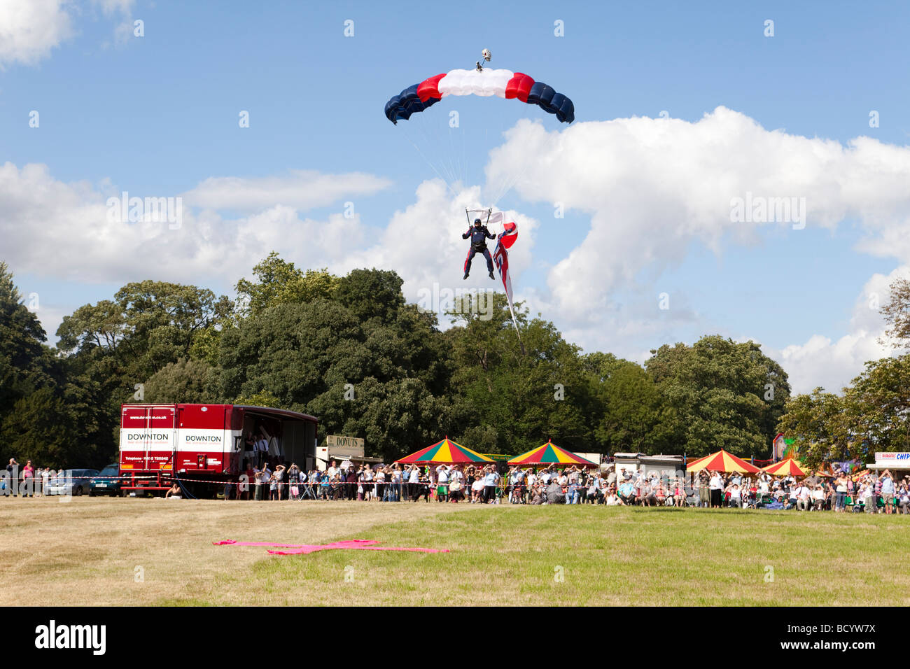 A parachutist from the Royal Navy Raiders Parachute Display Team ...