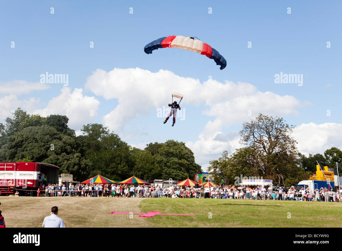 A parachutist from the Royal Navy Raiders Parachute Display Team ...