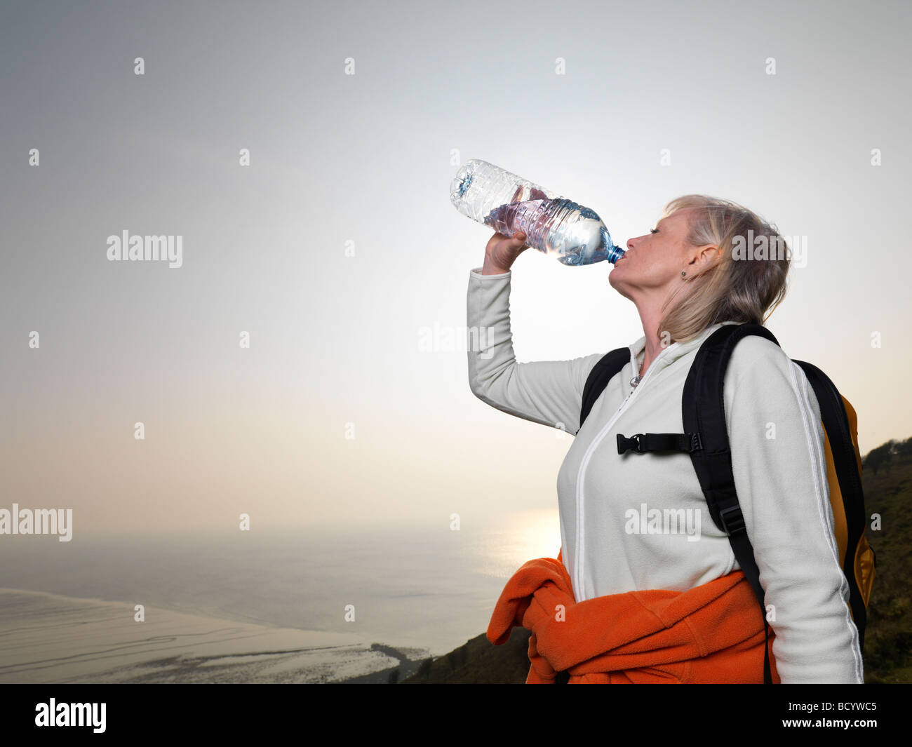 Woman getting water well hi-res stock photography and images - Alamy