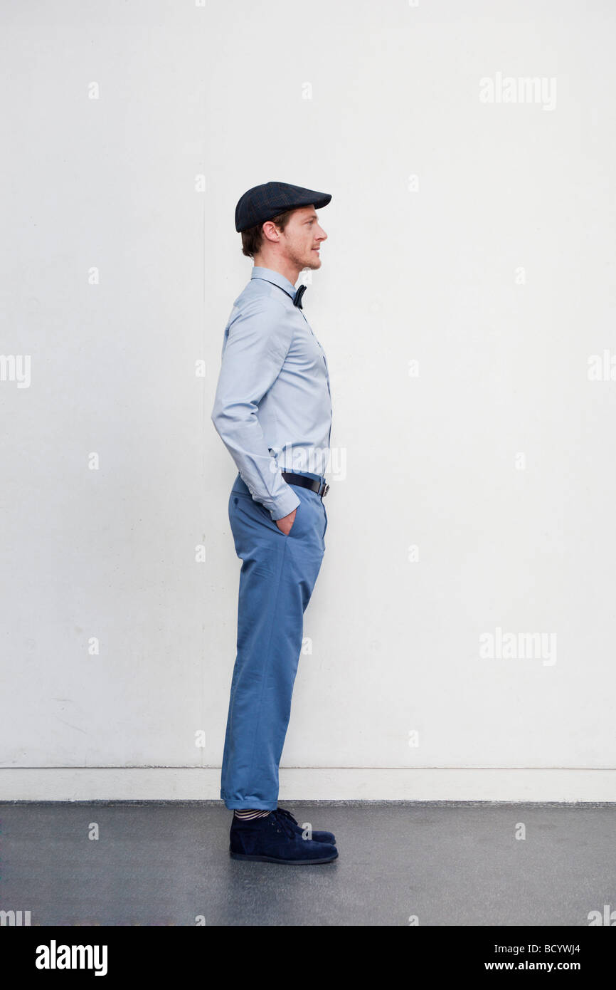 man standing upright Stock Photo - Alamy