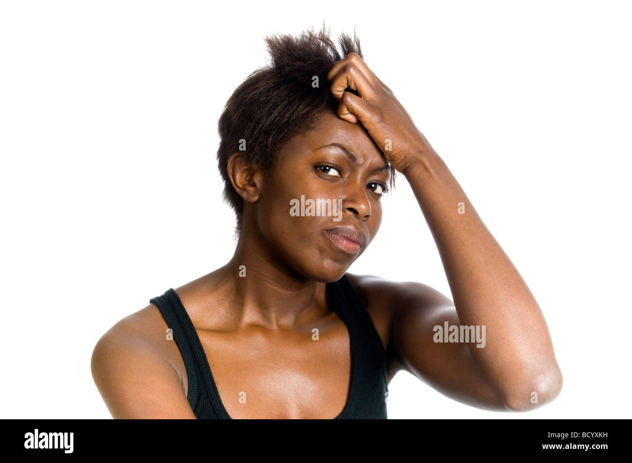 Horizontal close up studio portrait of an attractive African woman ...