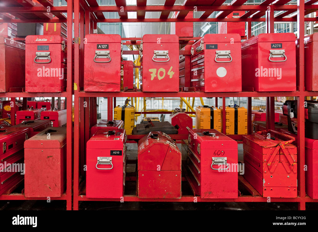Array of red toolboxes in an aircraft hangar Stock Photo - Alamy
