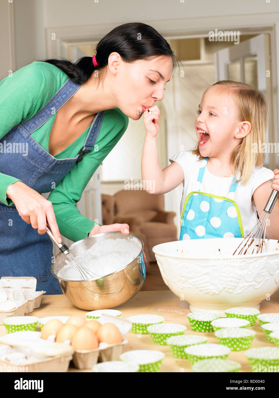 Mother and daughter cooking Stock Photo - Alamy