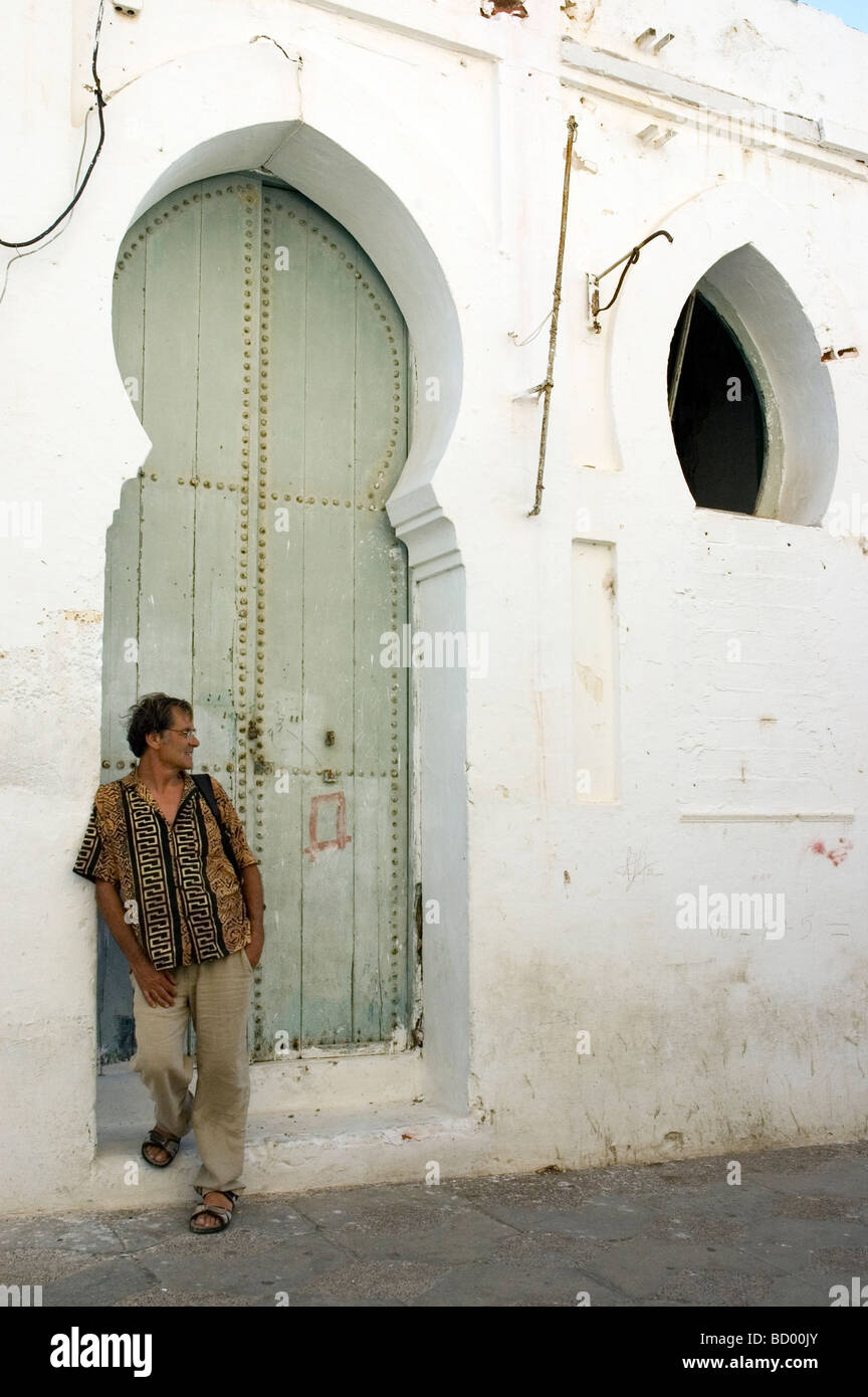Arched door in Asilah Stock Photo - Alamy