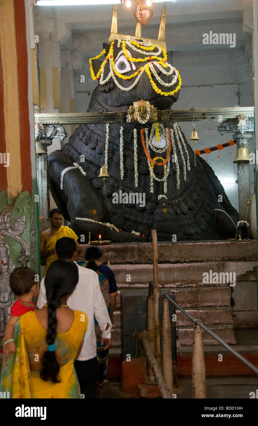 People attend Puja inside the Bull Temple in Bangalore India Stock ...