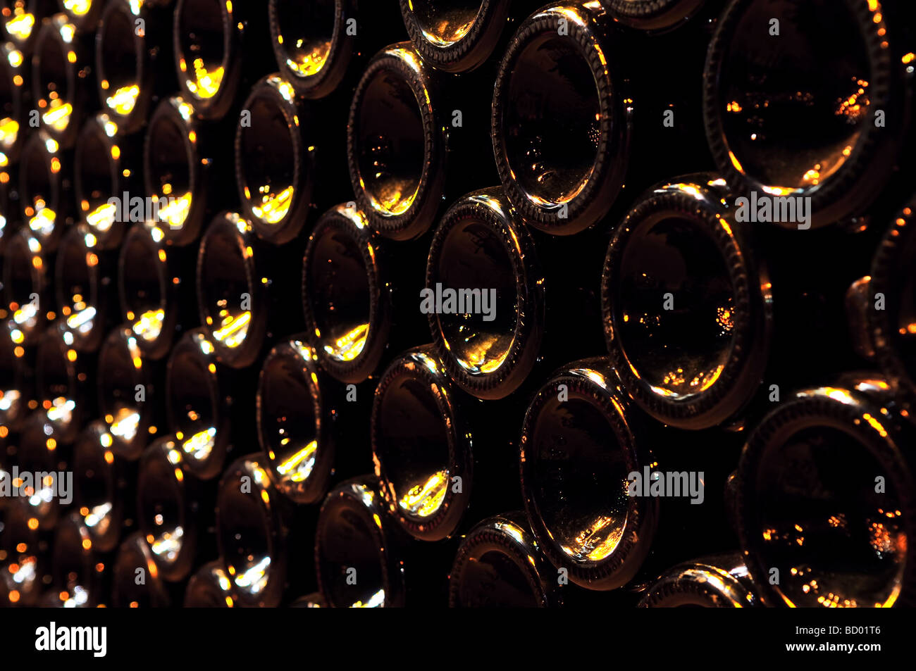Large stack of wine bottle bottoms in winery Stock Photo - Alamy