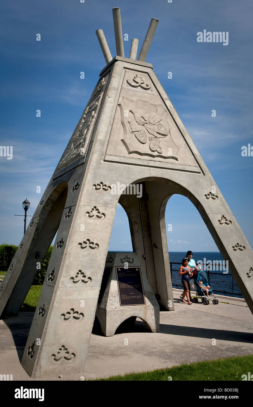 A tipi shaped artwork is seen on a promenade facing the lac St Jean ...