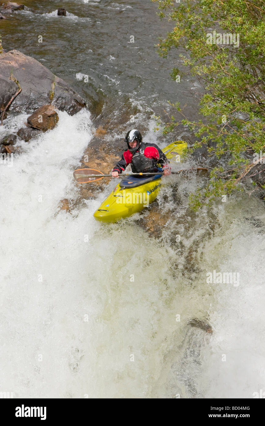 Kayakers in creek boat kayaks working rapids on Clear Creek above ...