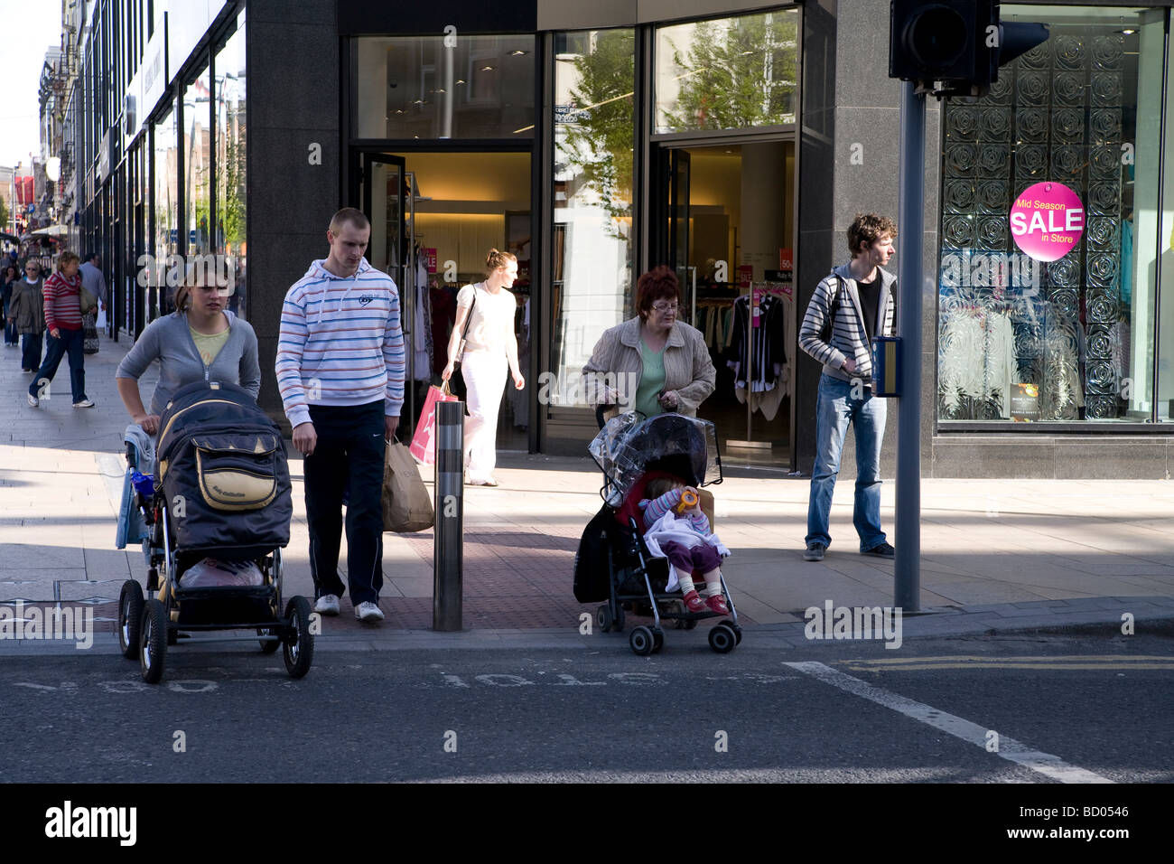 People at a crosswalk in Limerick, Ireland Stock Photo - Alamy