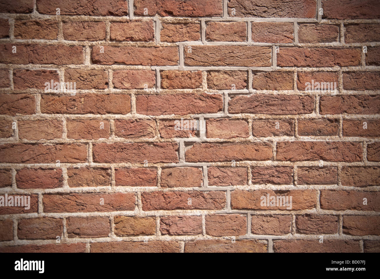 Pattern of a red stone brick wall Stock Photo - Alamy