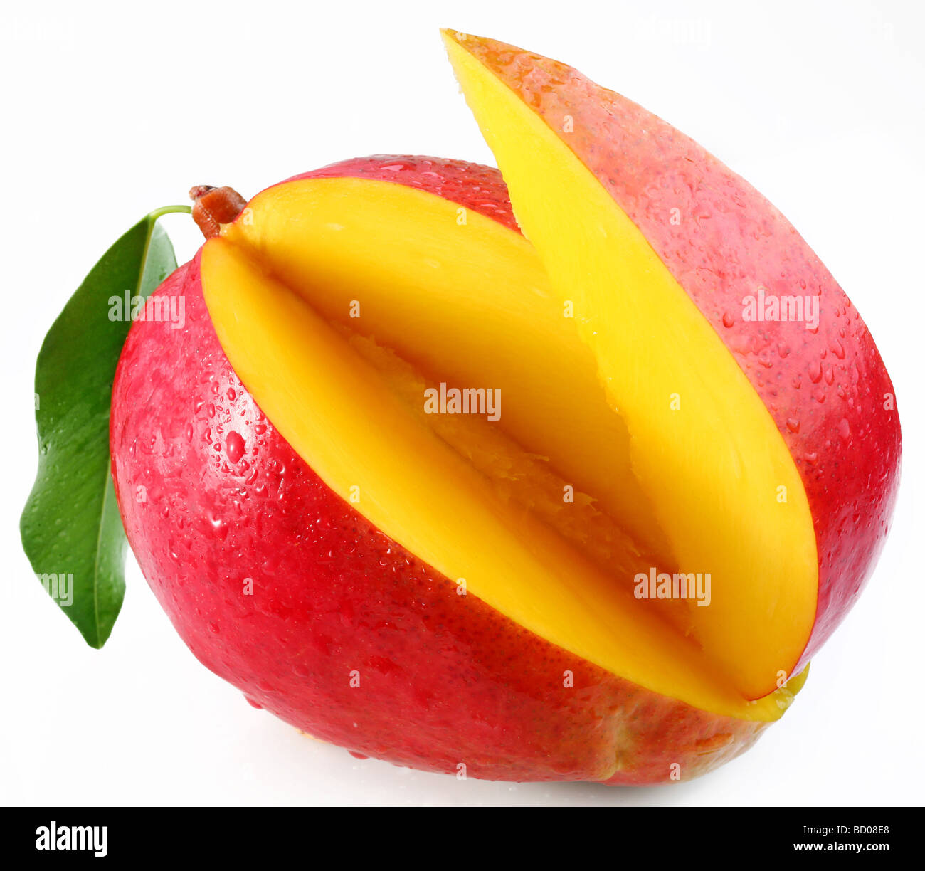 Mango with section on a white background Stock Photo - Alamy