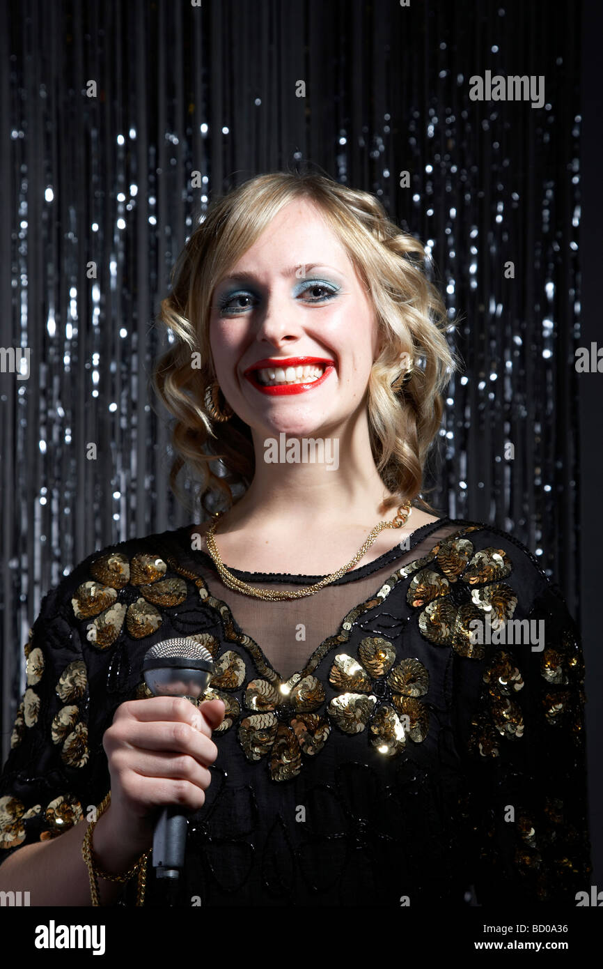 Studio portrait, karaoke singer Stock Photo - Alamy