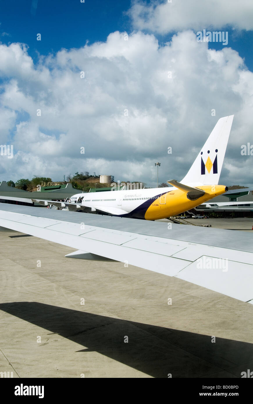Airplane on the airport of the caribbean island of Grenada Stock Photo ...