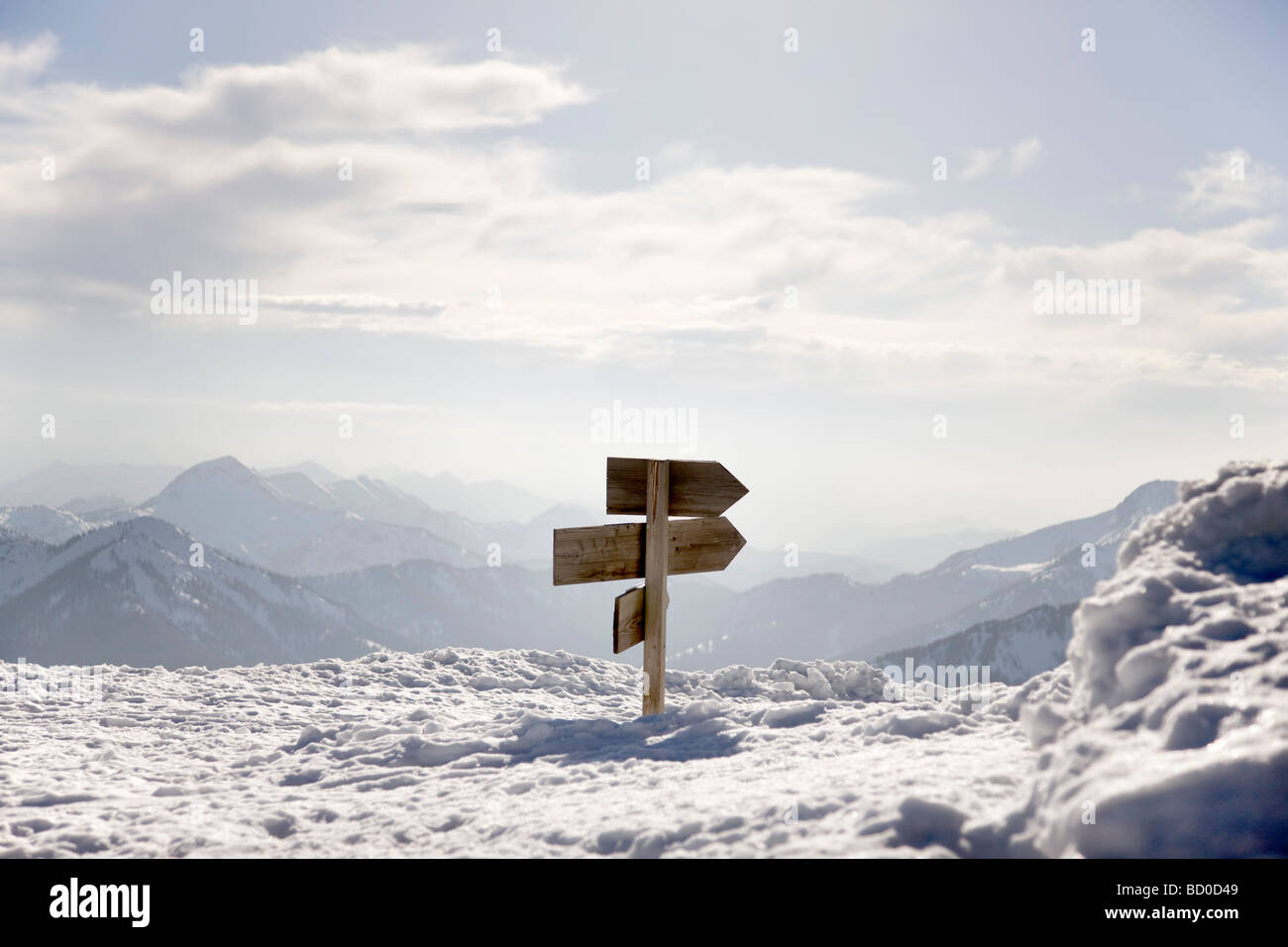 snow covered mountains, way sign Stock Photo - Alamy