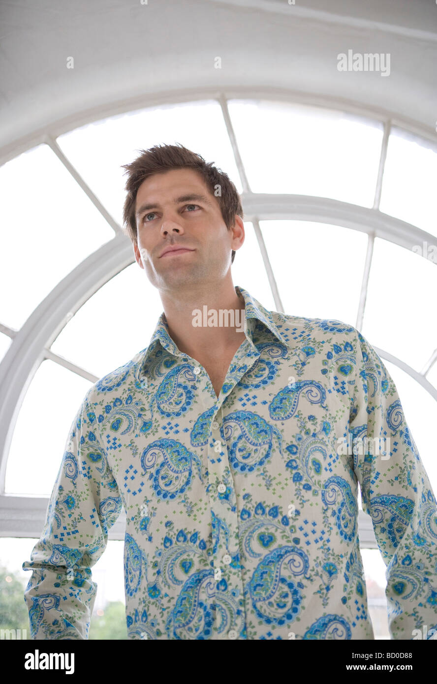 Portrait of a man looking up Stock Photo - Alamy