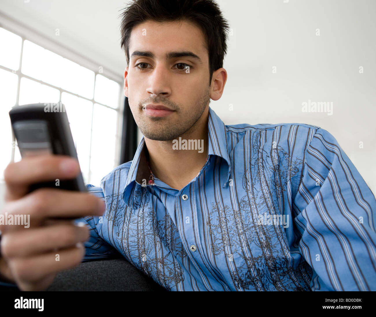 Man using a mobile phone Stock Photo - Alamy