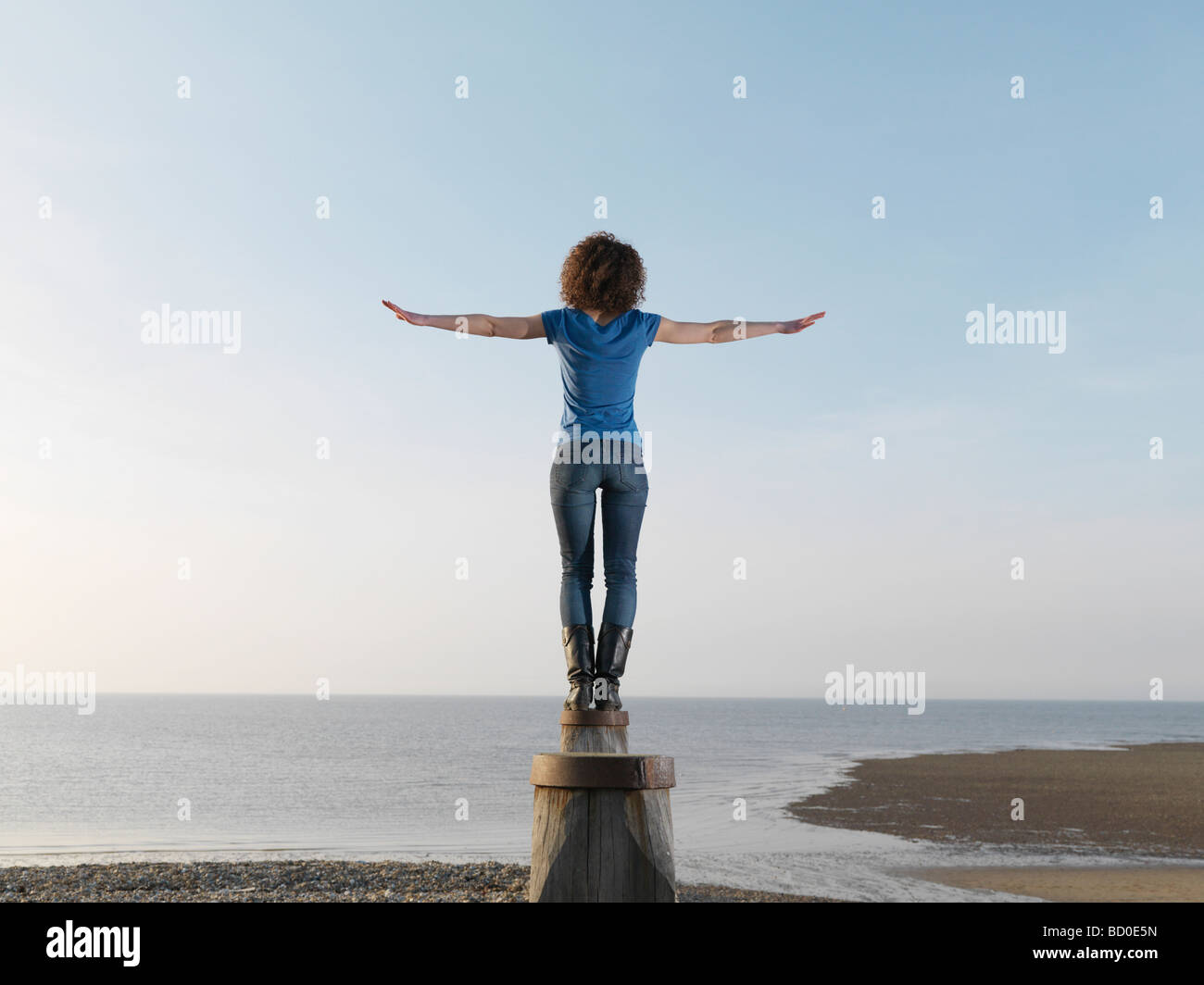 Woman balancing rear view hi-res stock photography and images - Alamy