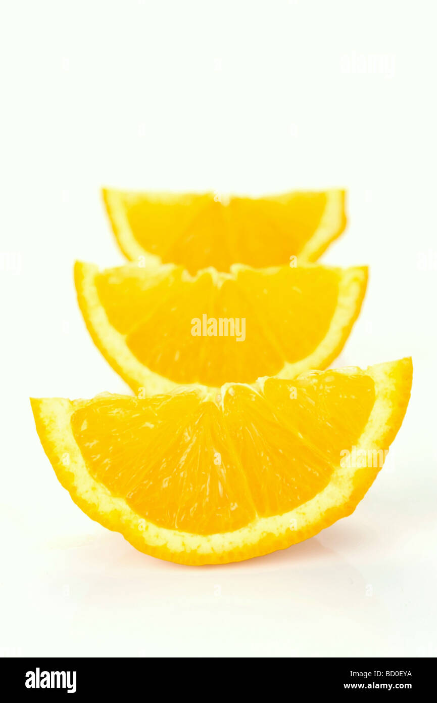 Fresh orange halves isolated against a white background Stock Photo - Alamy