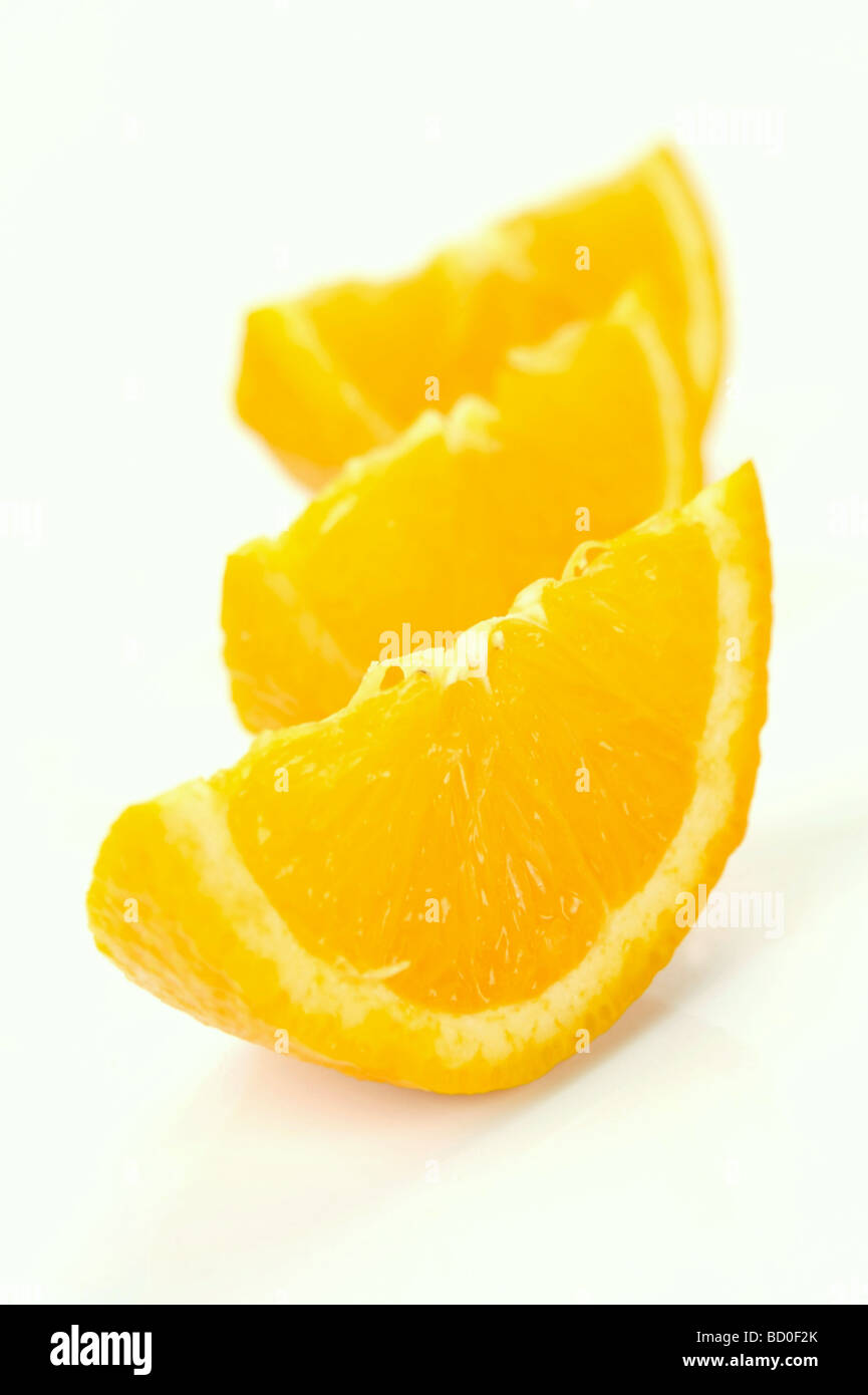 Fresh orange halves isolated against a white background Stock Photo - Alamy
