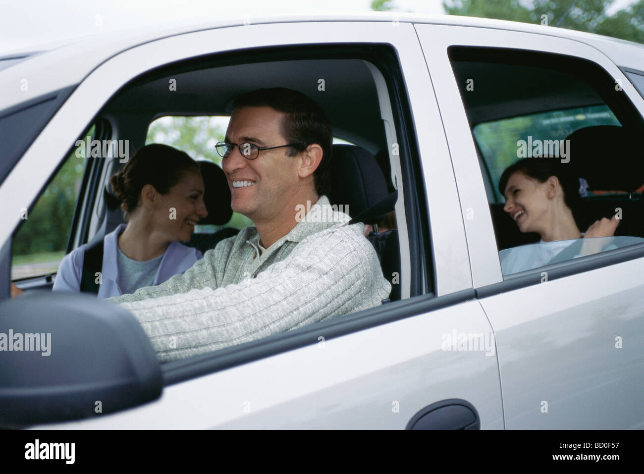 Mom driving daughter hi-res stock photography and images - Alamy