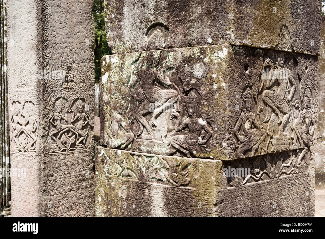 Carved bas relief designs on a temple at Angkor in Cambodia Stock Photo ...