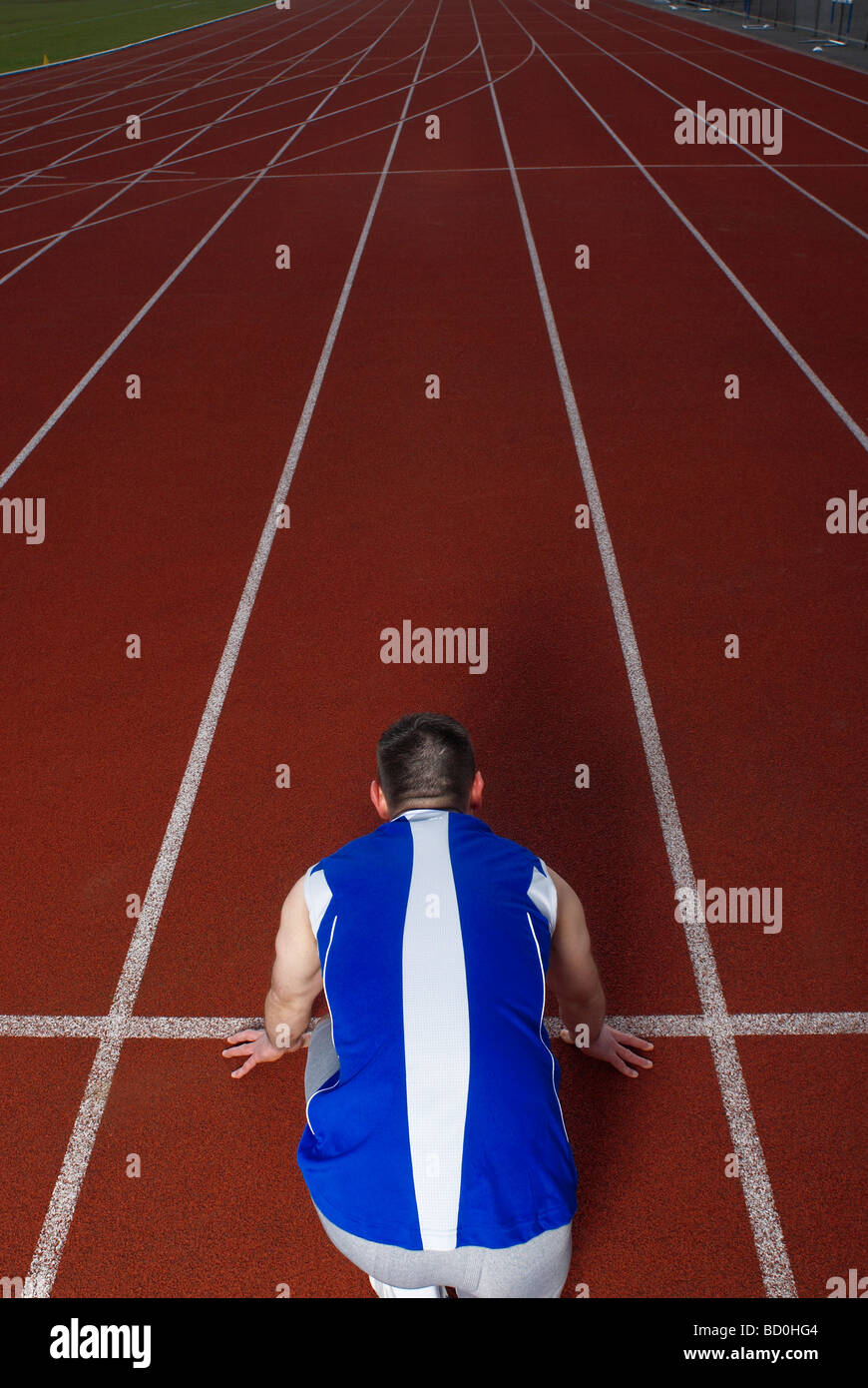 rear view of athlete at start Stock Photo - Alamy