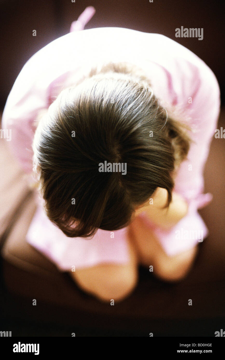 Woman sitting, high angle view Stock Photo - Alamy