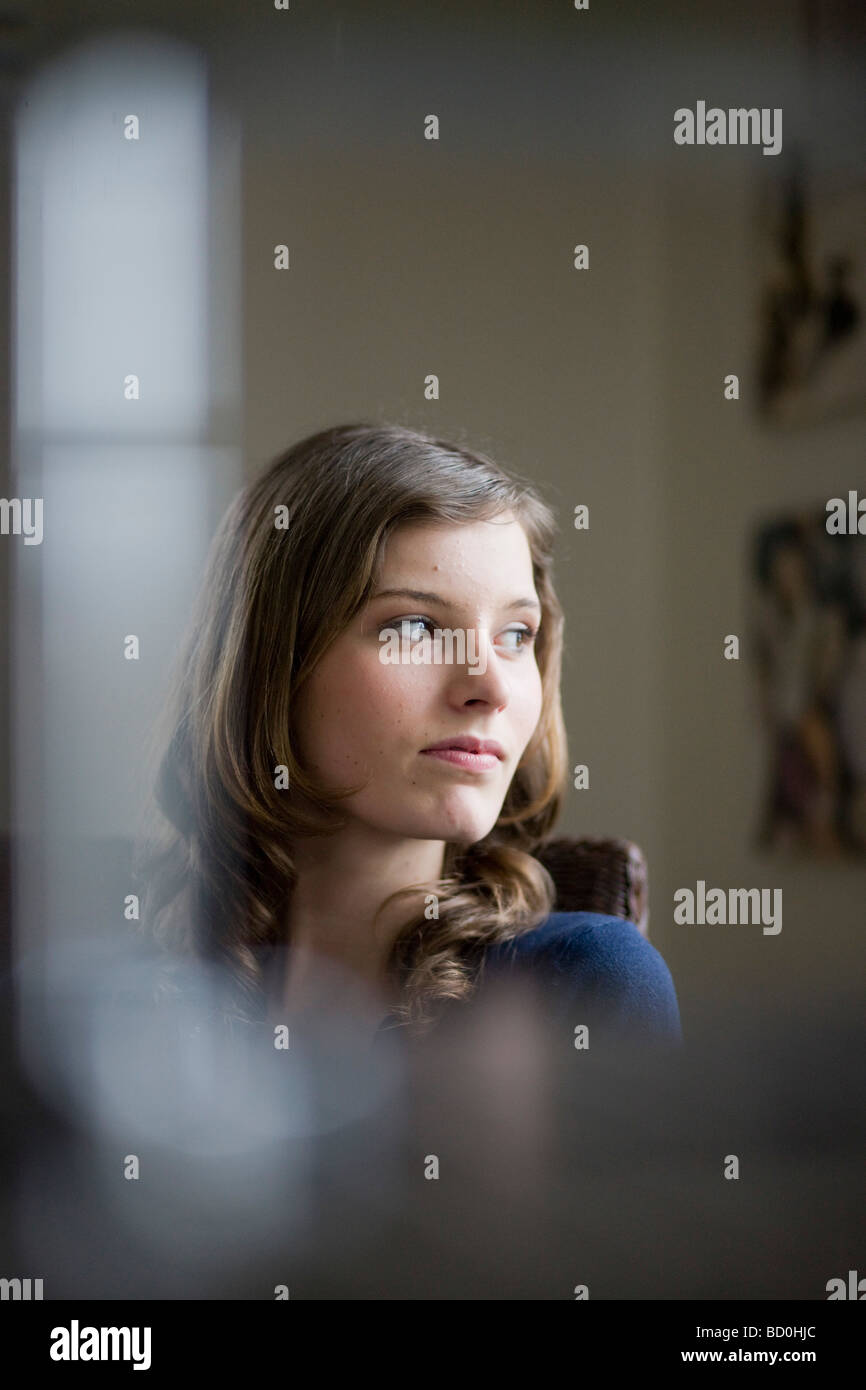 girl looking around a room Stock Photo - Alamy